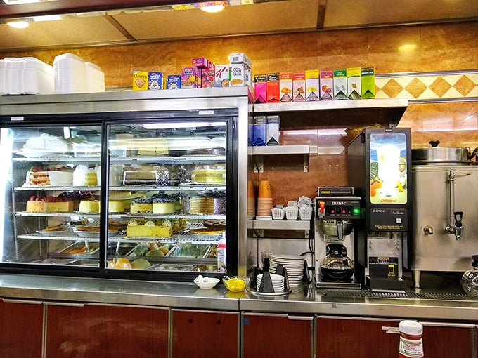 The dessert case—where willpower goes to die and "I'll just have coffee" turns into "and a slice of that cheesecake, please."