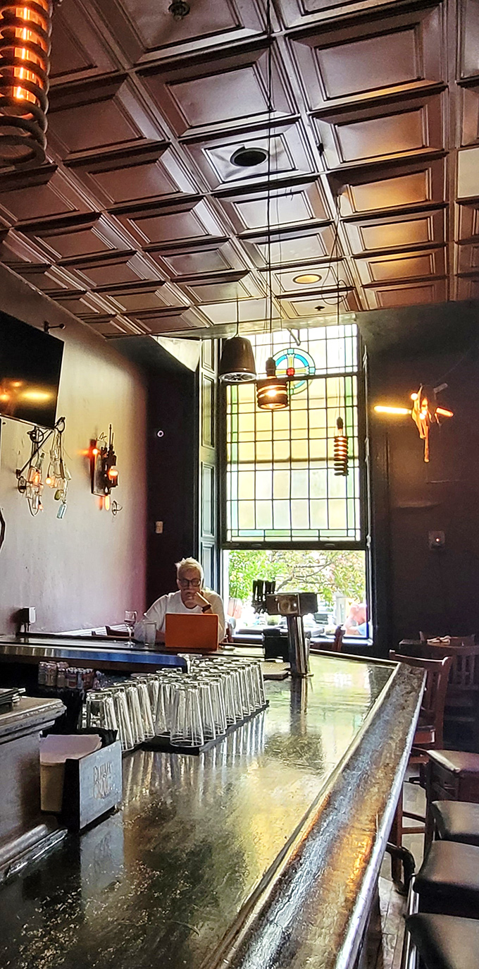 Where history hangs out. The stunning stained glass window and ornate ceiling create a dining atmosphere that's part cathedral, part comfortable neighborhood joint.