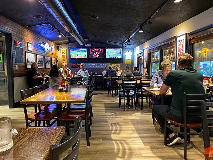 Where locals gather to share stories and appetizers with equal enthusiasm. Those TVs aren't the main attraction—the conversations are.