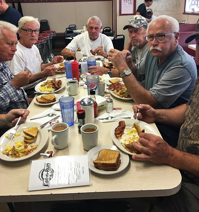 The regulars' table—where local wisdom is exchanged, coffee is endless, and nobody's checking their phone every three minutes.