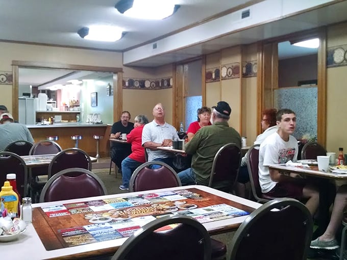 The dining room hums with conversation and clinking silverware – a symphony of small-town America that plays daily at lunchtime.
