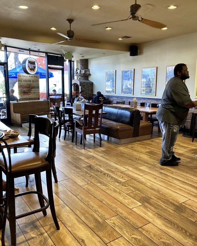 The dining area's warm wooden floors and comfortable seating invite you to stay awhile. Fried chicken this good deserves your full attention.