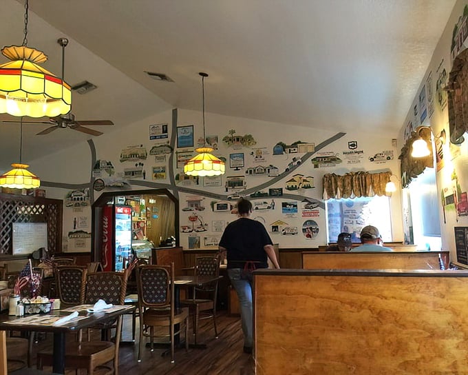 The dining room feels like it was designed by someone who actually eats in restaurants, not just photographs them for Instagram.