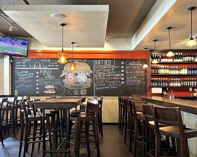 The chalkboard menu wall serves as both information center and art installation, with hand-drawn burgers that prime your appetite.