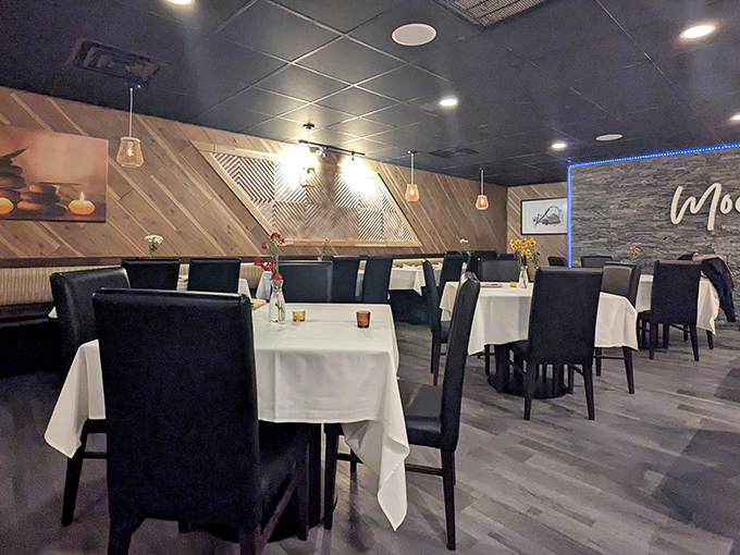 Clean lines, thoughtful spacing, and those pendant lights creating the perfect mood—someone clearly understands the architecture of dining well.