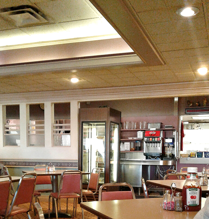 The beverage station – where sweet tea flows and conversations pause only long enough to decide between regular or diet.