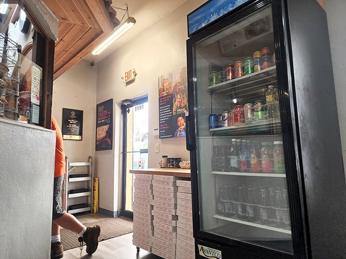 The drink cooler—unsung hero of the pizza experience. Because sometimes only an ice-cold soda can properly complement that perfect slice.
