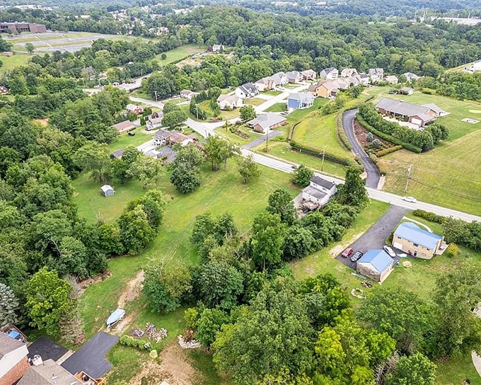 Another drone perspective shows how Saltsburg's neighborhoods blend seamlessly with the surrounding countryside—no harsh urban boundaries here.