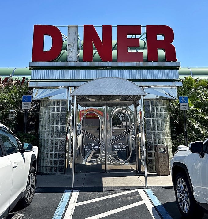 Those glass block windows and bold red DINER sign aren't just design choices—they're promises that inside, time slows down and comfort speeds up.