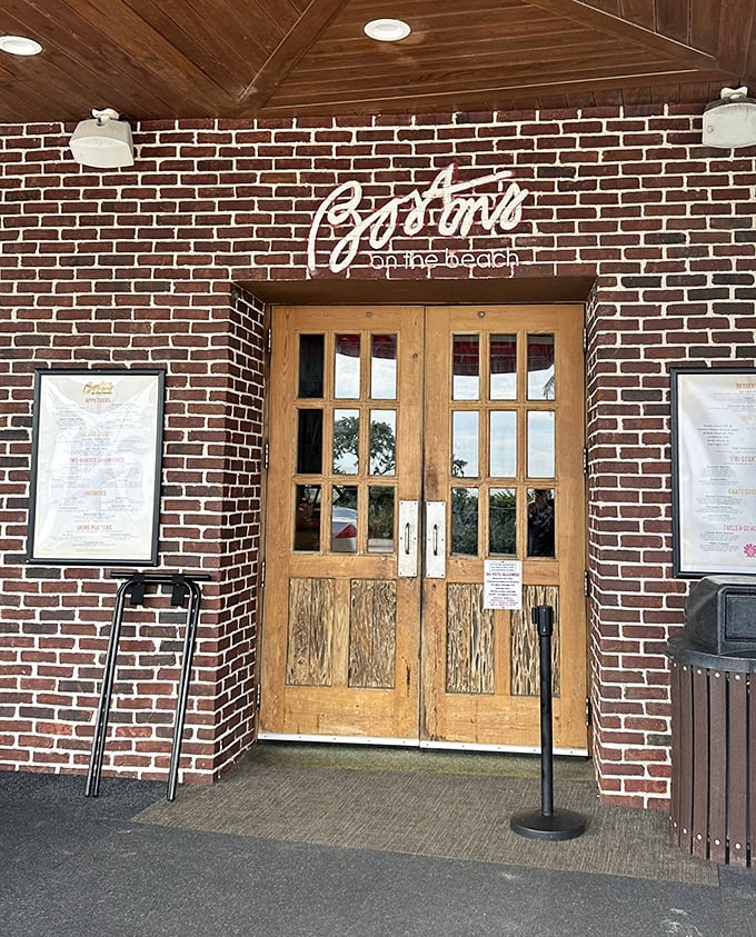 The entrance promises what lies beyond – a brick-framed portal to New England flavors with a side of Florida sunshine.