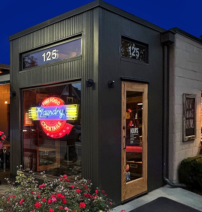 The neon sign glows like a beacon for hungry travelers. "Fine Food & Cocktails" isn't just a promise—it's a guarantee.