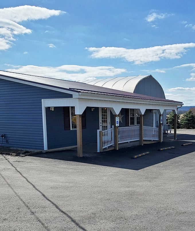 Blue skies frame the diner's distinctive curved roof—architectural proof that sometimes the best things in life aren't square.