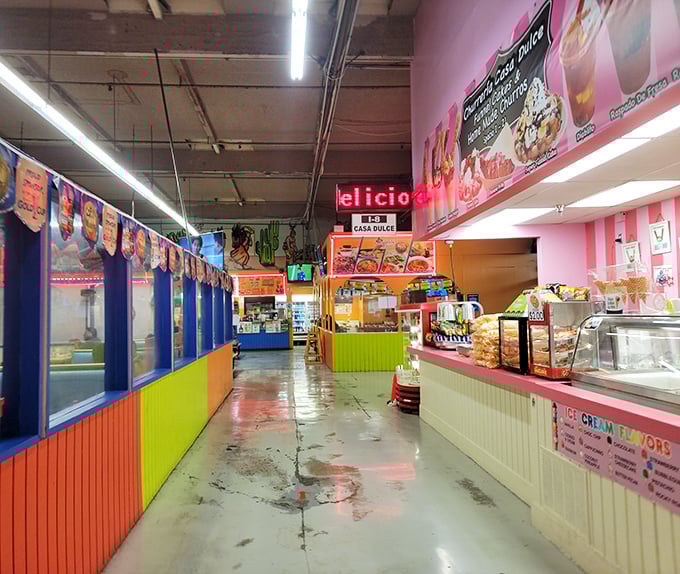 The food court explodes with color as vibrant as its flavors—a kaleidoscope of culinary delights that demands multiple visits.