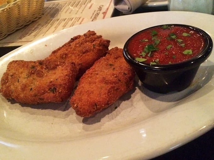 Fried risotto balls guarding their marinara companion—the crunch you hear now is the sound of willpower crumbling across Pennsylvania.