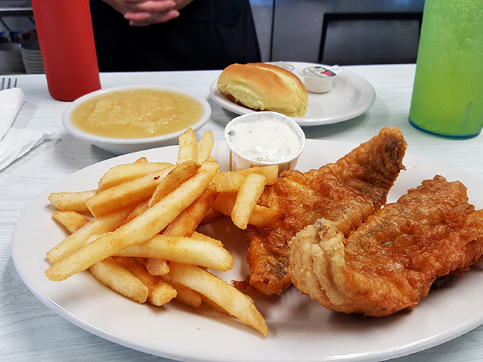 Fried fish so perfectly golden, it deserves its own trophy. The kind of meal that makes you forget your table manners.