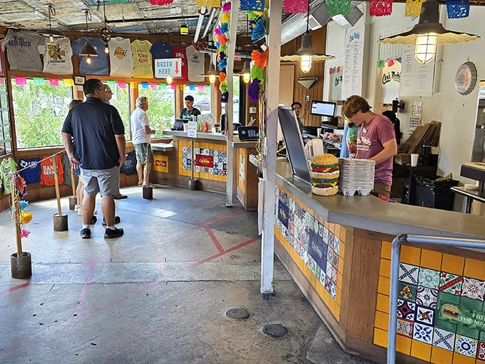 The ordering counter – that magical place where you speak your desires and they return as cheese-covered dreams come true.