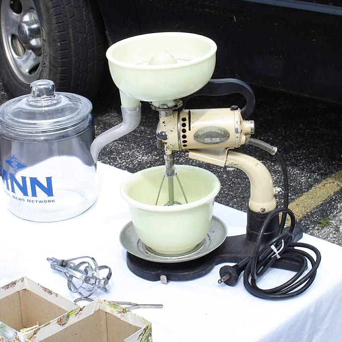That jade-colored mixer isn't just kitchen equipment – it's a mechanical time capsule from when baking was an arm workout.
