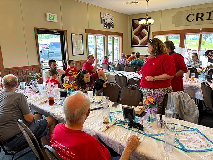 A gathering of diners sharing stories and laughter, proving that the best restaurants don't just fill stomachs—they create communities one meal at a time.
