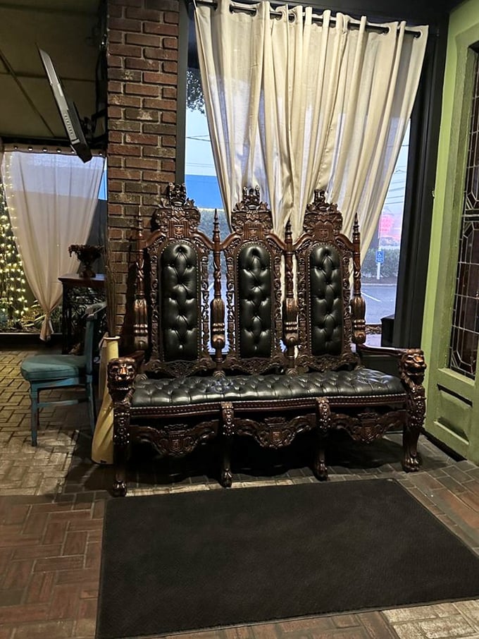 This isn't just a waiting area—it's a throne room. That ornate bench looks like it could have seated racing royalty while they waited for their table.