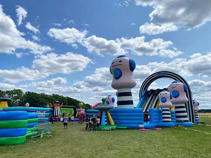 Not exactly wilderness adventure—this inflatable playground reminds us that sometimes nature appreciation comes with bounce houses and sugar-fueled excitement.