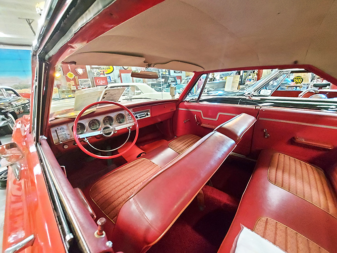 Red leather interior so pristine you'd feel guilty eating a drive-through burger in it. This isn't a car – it's automotive couture.