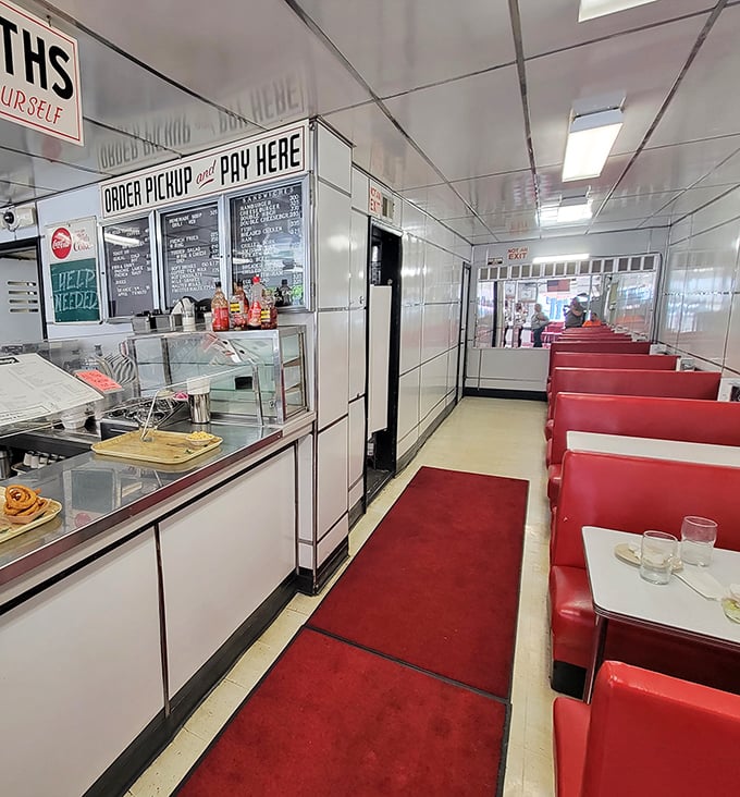 The diner runway—a red carpet leading to comfort food paradise. This narrow passage has launched thousands of satisfied sighs and loosened belts.