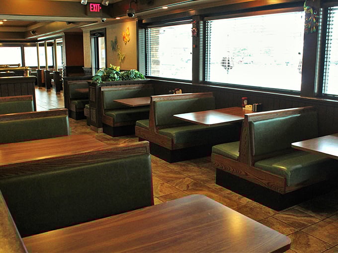 Booth seating arranged for maximum comfort and minimal eavesdropping – though overhearing food recommendations is a bonus perk.