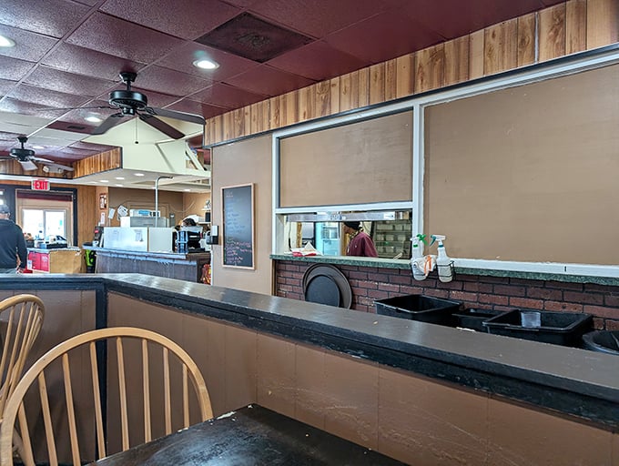 A glimpse into the restaurant's interior – where ceiling fans gently stir the aromas of soul food into a symphony that makes waiting for your order deliciously torturous.