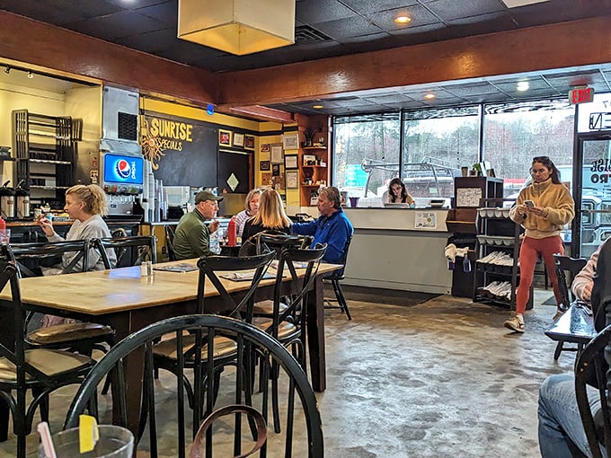 The dining room hums with morning energy as patrons fuel up for the day. That palm tree logo watches over all, a sunny sentinel of breakfast bliss.