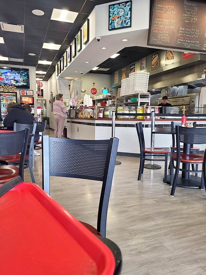 The counter service setup isn't just efficient—it's the stage where pizza dreams come true. Those menu boards aren't just lists—they're promises.