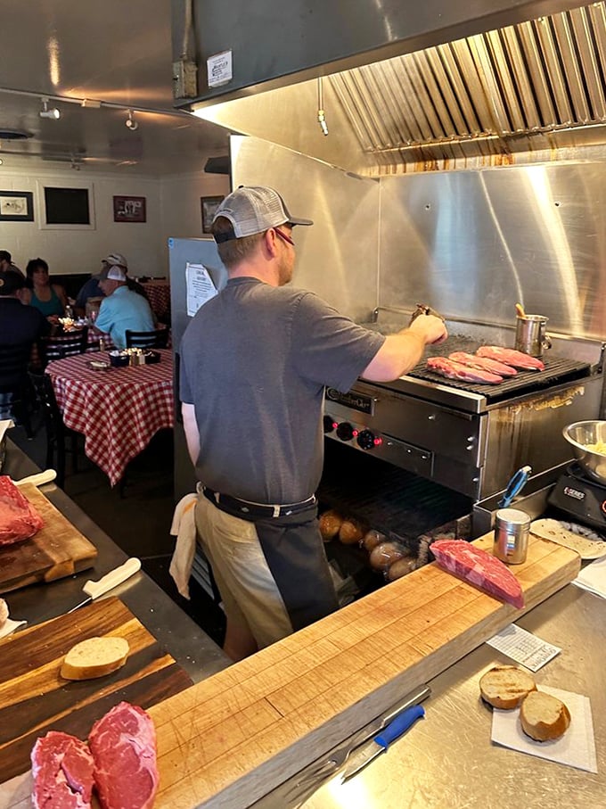 Where the alchemy happens—transforming raw cuts into carnivorous gold. The grill master works with the focus of a surgeon and the timing of a comedian.
