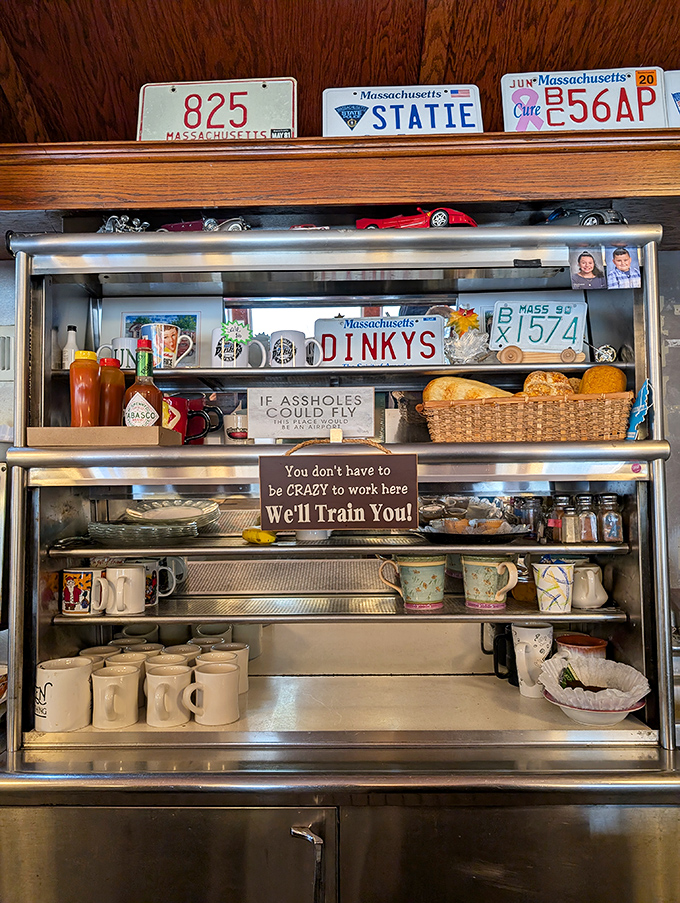 Behind every great diner is a shelf of personality. That sign promising to "train you" speaks volumes about the humor keeping this place authentic.
