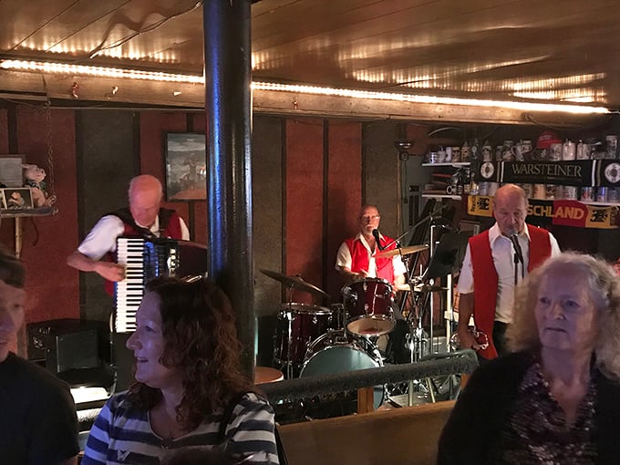 Live music transforms dinner into an event. These musicians aren't background noise—they're the soundtrack to your schnitzel experience.