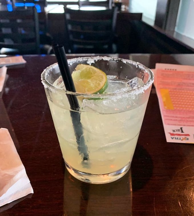 The margarita – perfectly balanced between sweet, sour, and "maybe I should call an Uber" – with a salt rim that's actually worth licking.