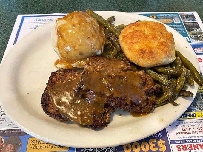 Meatloaf that would make your mother jealous, swimming in gravy that should be bottled and sold as liquid happiness.
