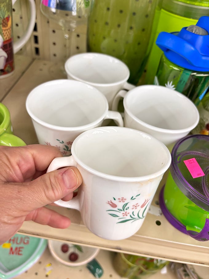 Coffee mugs with delicate floral patterns sit waiting to make someone's morning routine a little more charming and beautiful.