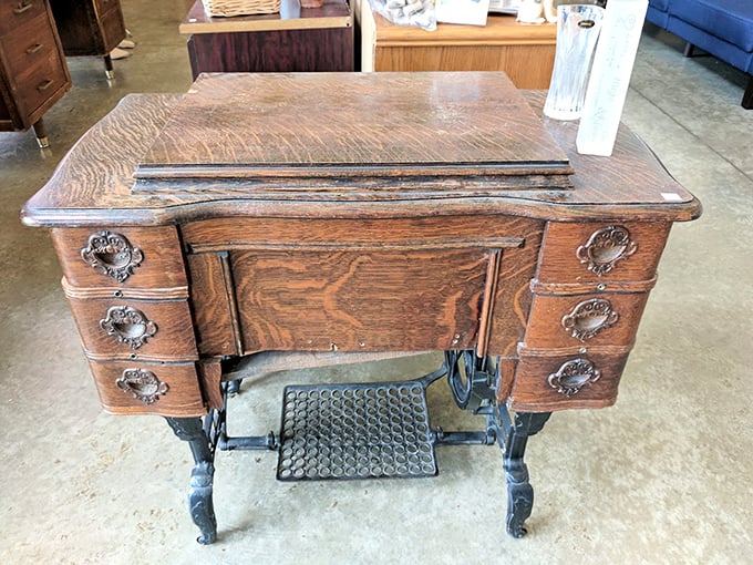 This isn't just an antique sewing table—it's a piece of history with drawers full of stories and craftsmanship rarely seen today.