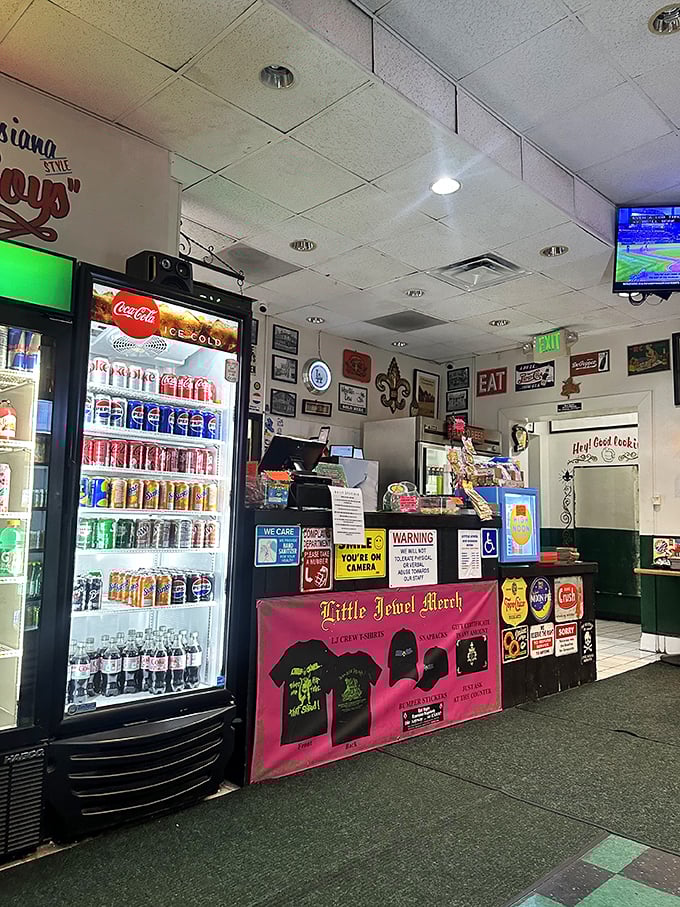 Merch for sale and cold drinks on display—because after that first po'boy, you'll want something to remember this place by.