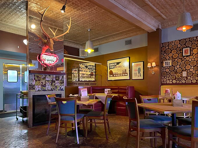 Antlers, wood-paneled walls, and vintage signs create the perfect backdrop for serious barbecue consumption—like a hunting lodge that hired a genius chef.