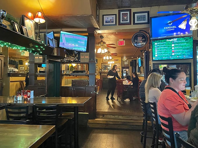 The dining room buzzes with conversation and clinking glasses – that perfect pub energy where everyone feels like a regular.