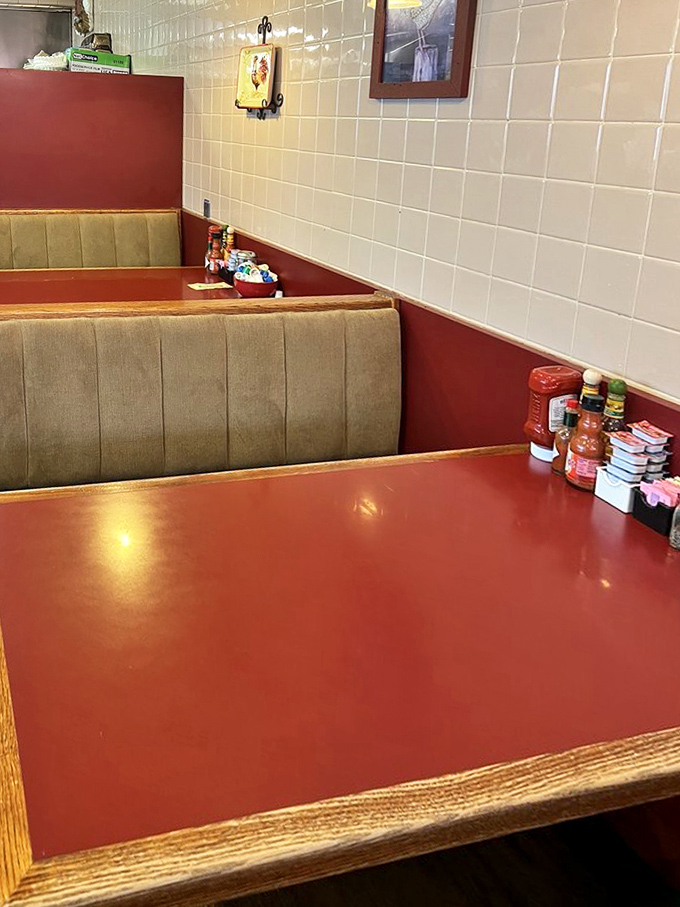 Cozy booth seating with all the essentials – condiments at the ready for whatever breakfast adventure you choose.