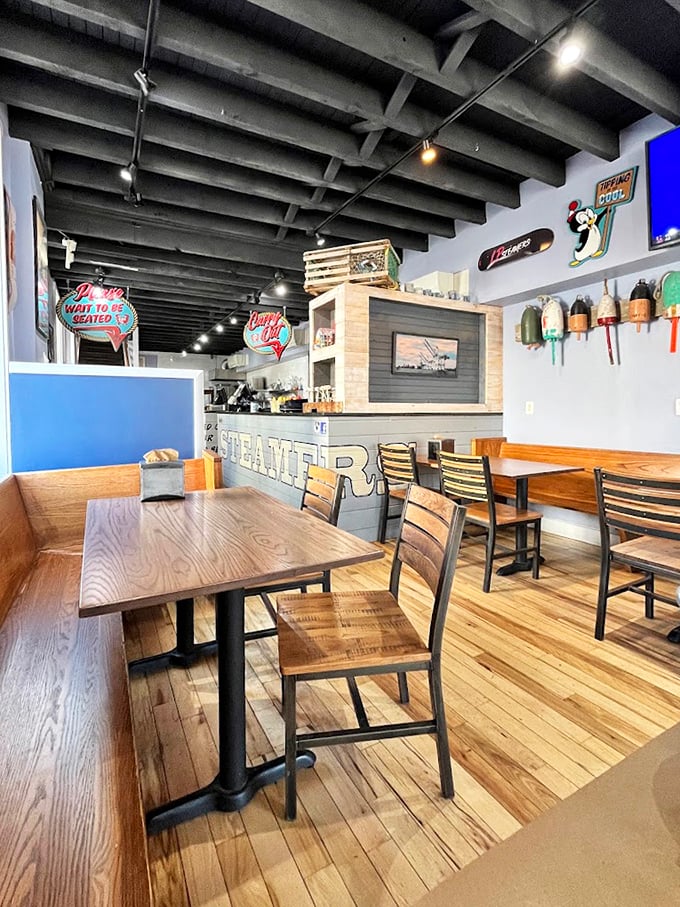 Wooden floors and exposed beams create that perfect maritime atmosphere where seafood stories and Baltimore legends are shared.