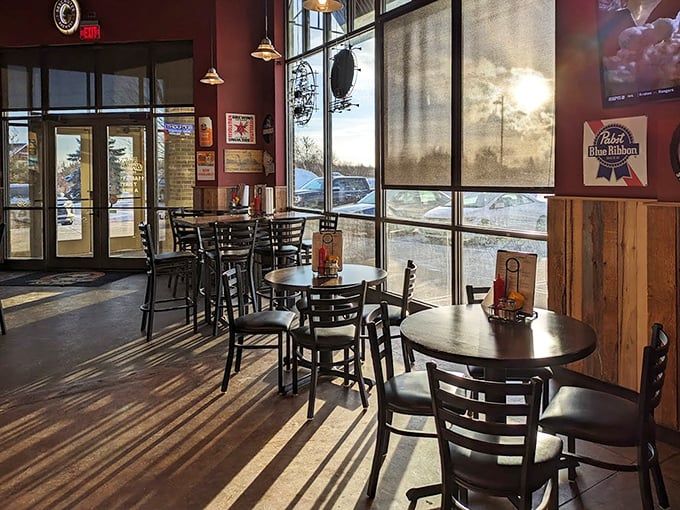 Sunlight streams through tall windows, creating the perfect lighting for both your burger and the inevitable food photos you'll be taking.