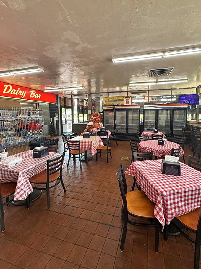 Red and white checkered tablecloths—the universal signal that you're about to enjoy food that prioritizes comfort over pretension.