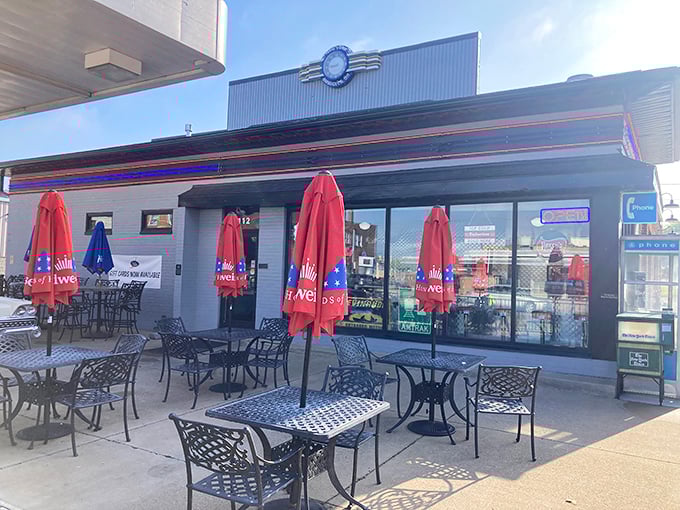 The outdoor patio at Chloe's—where fresh air meets comfort food. Those red umbrellas provide shade for serious eating business.