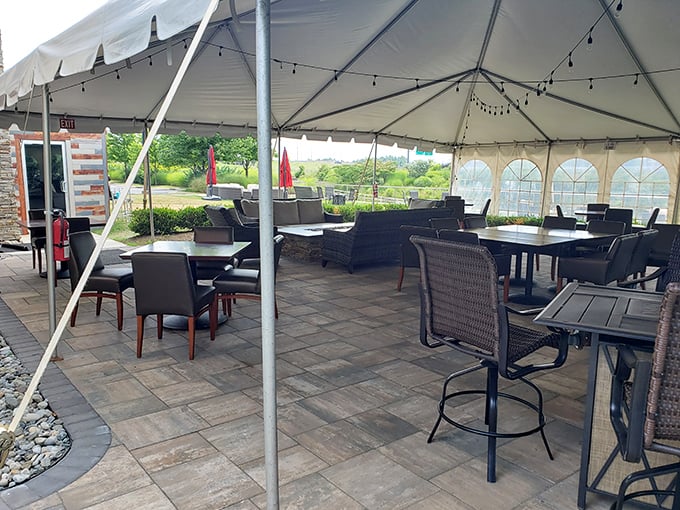 Al fresco dining with a side of Virginia sky. The tent suggests permanence, the string lights promise magic.