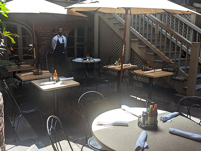 The courtyard dining area offers a breath of fresh air and dappled sunlight—nature's perfect seasoning for any meal.