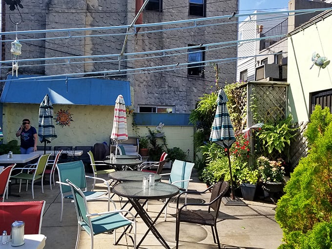 The secret garden patio – where summer brunches feel like you've discovered Philadelphia's best-kept dining secret.