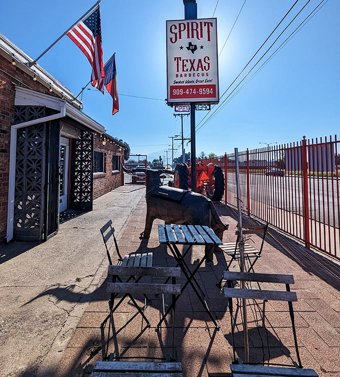 Al fresco dining, Texas-style. That smoker in the background isn't just equipment—it's the beating heart of this barbecue sanctuary.