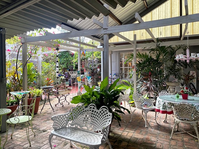 An outdoor patio where Florida weather meets Victorian sensibilities – the best of both worlds under one pergola.